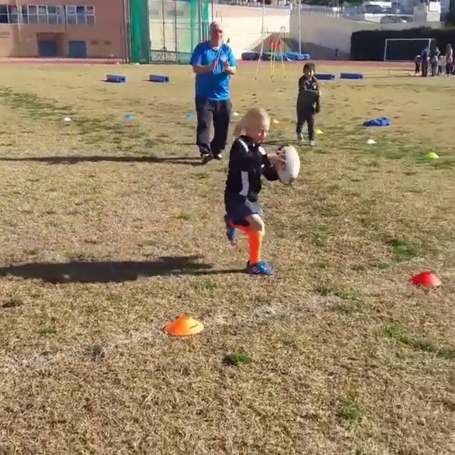 Two Kids Practice Rugby with Coach - Poke My Heart