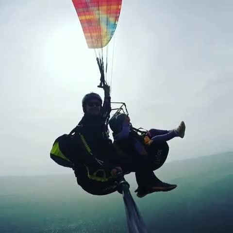 Two-Year-Old Girl Goes Paragliding With Dad - Poke My Heart