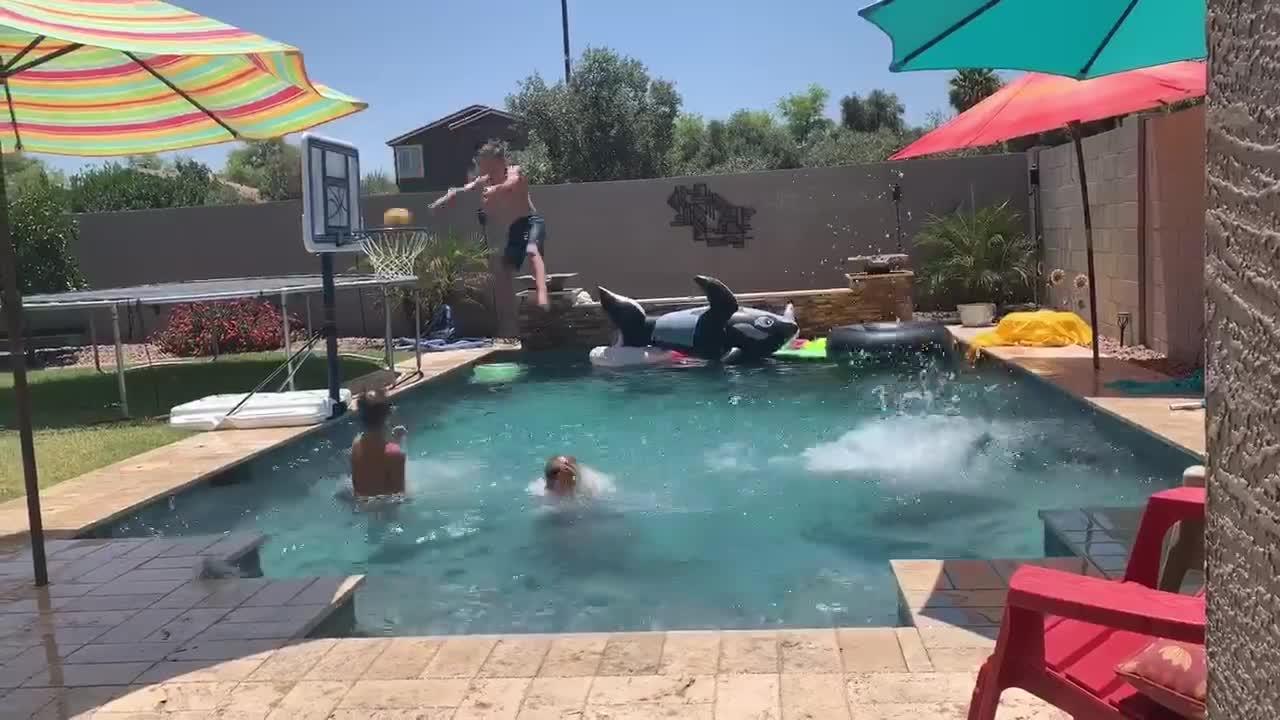 Four Boys Perform Basketball Trick Shot in Pool - Poke My Heart